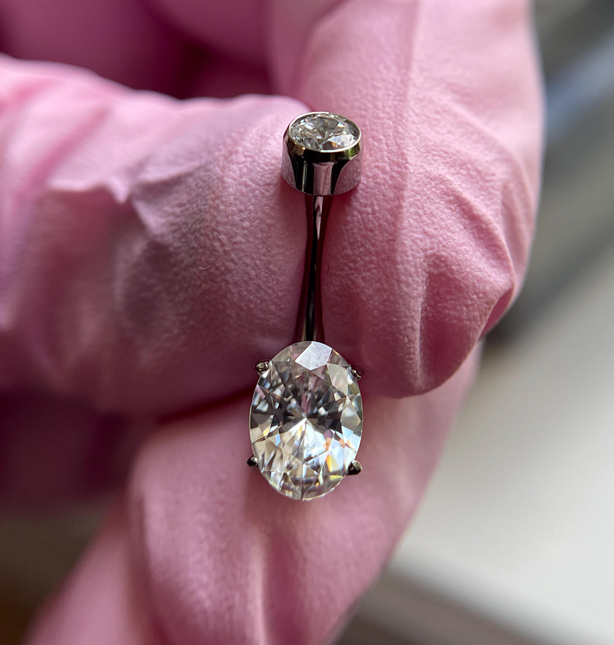 Clear CZ Oval-Cut Navel Curve by Anatometal | Diamond Heart Studios